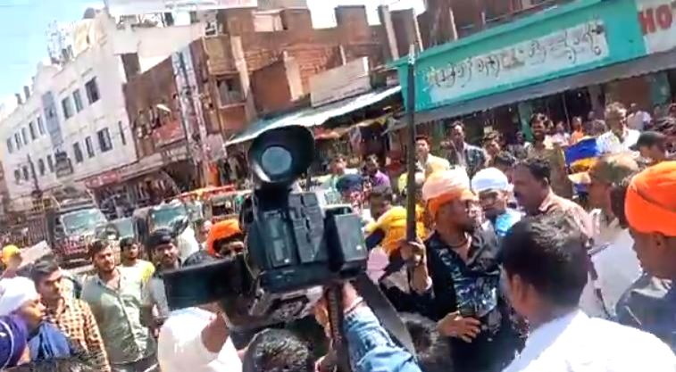 Free photo : Sikh youth wield swords while going on bike, lathicharged ...