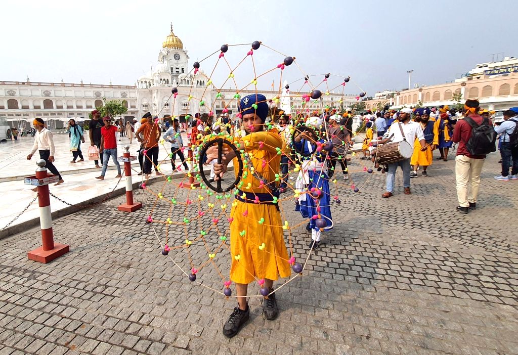 Sikh youths perform 'Gatka' a traditional martial art.