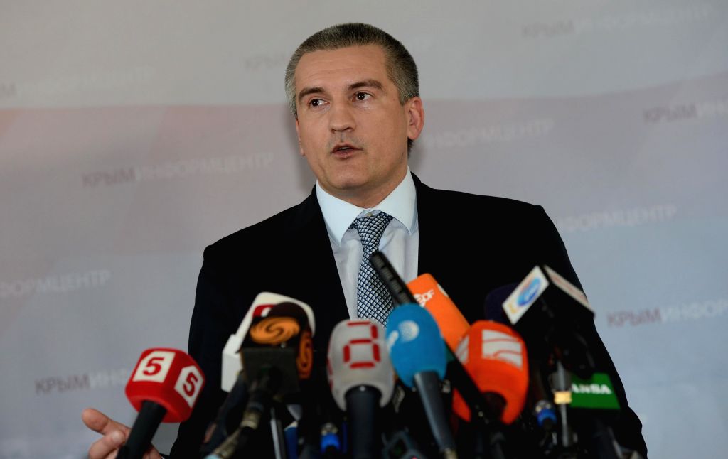 Crimean Prime Minister Sergiy Aksyonov speaks during a press conference