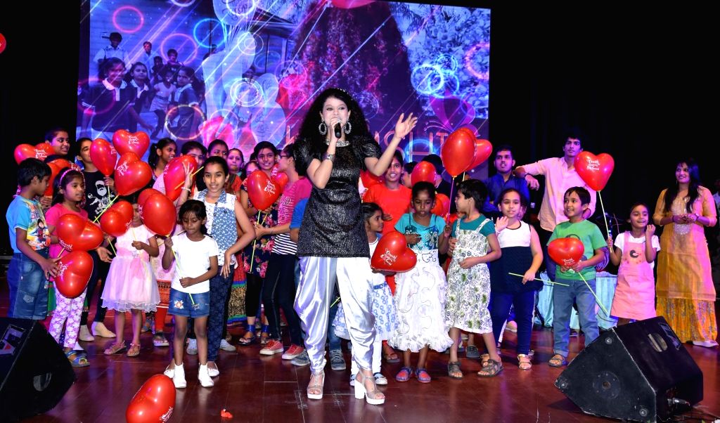 Palak Muchhal performs during a programme