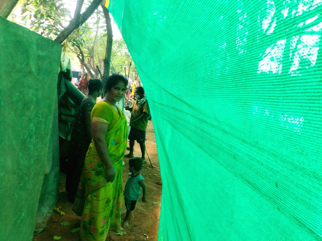 Free Photo : Slums near Vizag airport 'covered' for G20 meet