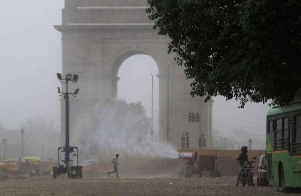 Smog gun spraying during the heavy Storm at India gate in new Delhi