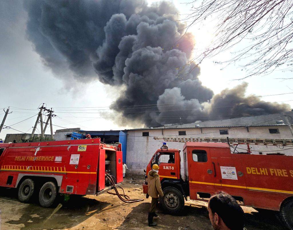 Smoke billow after a fire boke out at a shoe factory