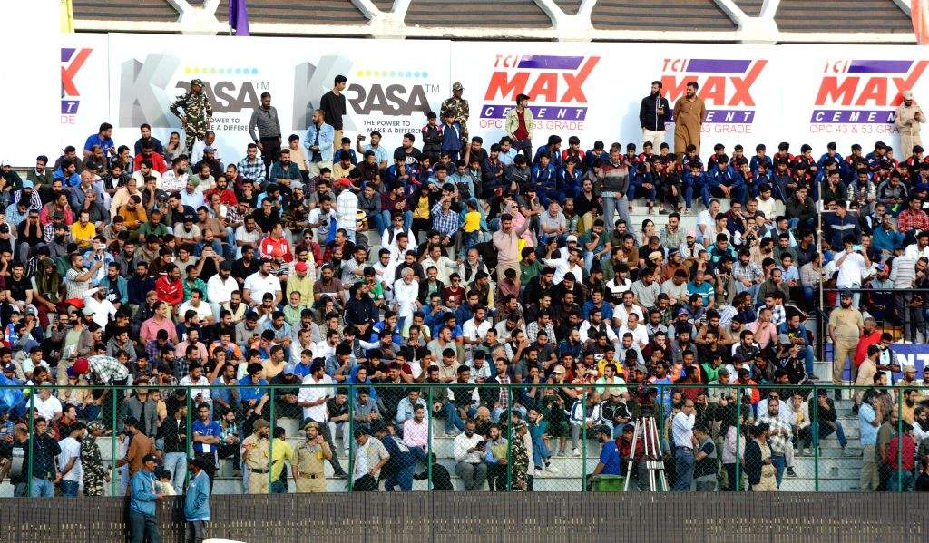 Spectators at Bakshi Stadium for the Legends League Cricket match