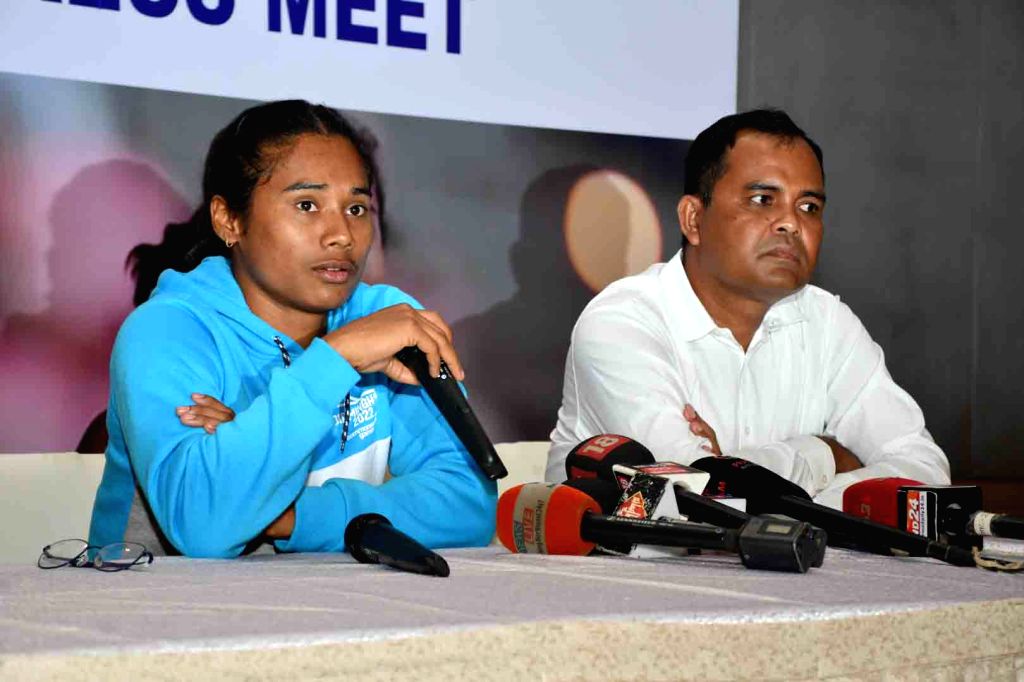 Sprinter Hima Das speaking at a press meet after her return from ...
