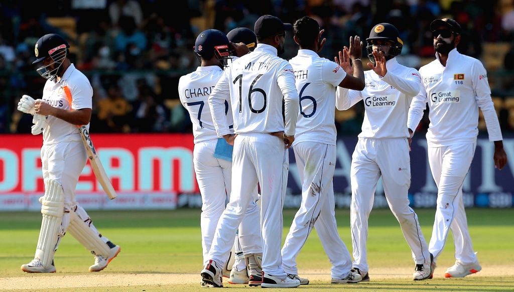:Bengaluru:Sri Lanka's Lasith Embuldeniya and teammates celebrate.