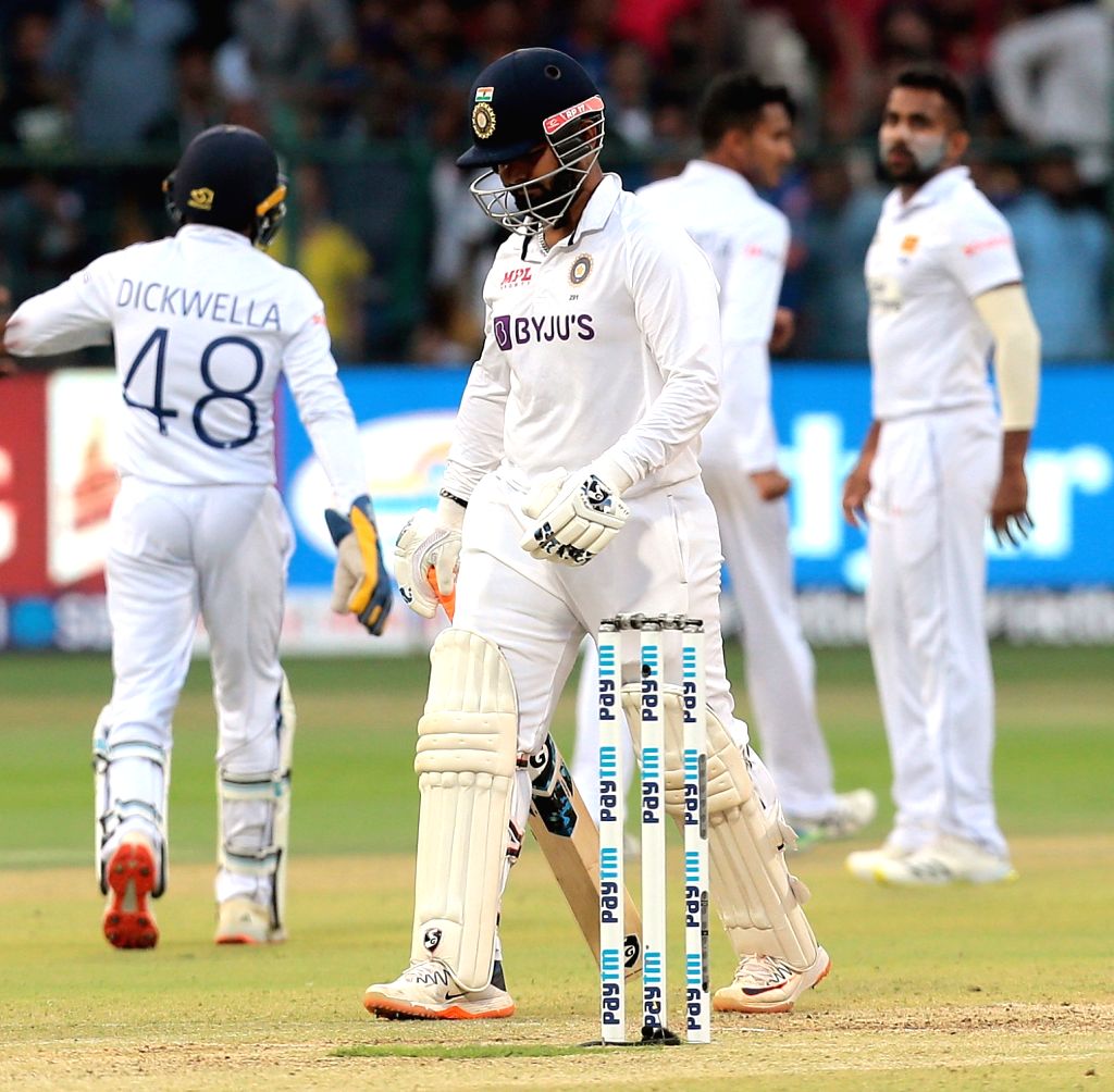 :Bengaluru:Sri Lanka's Praveen Jayawickrama, celebrates with teammates ...