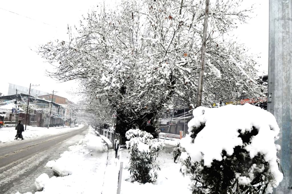 A view of snow covered area amid fresh snowfall