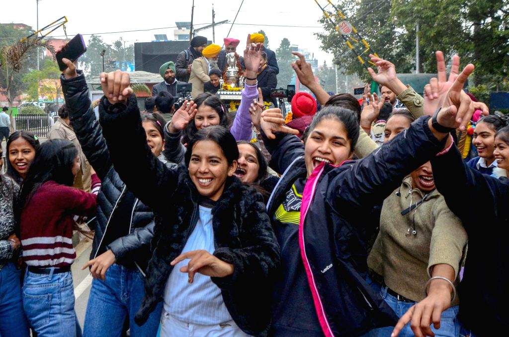 Staff and students celebrate as the Maulana Abdul Kalam Azad Trophy ...
