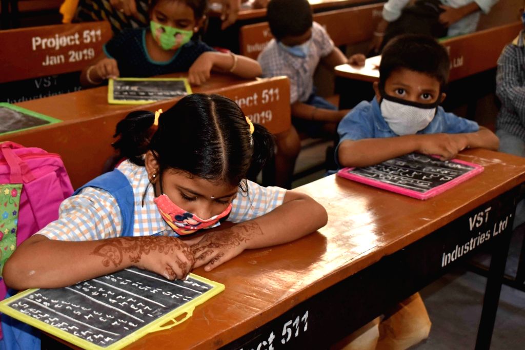 Students attend their class at a school