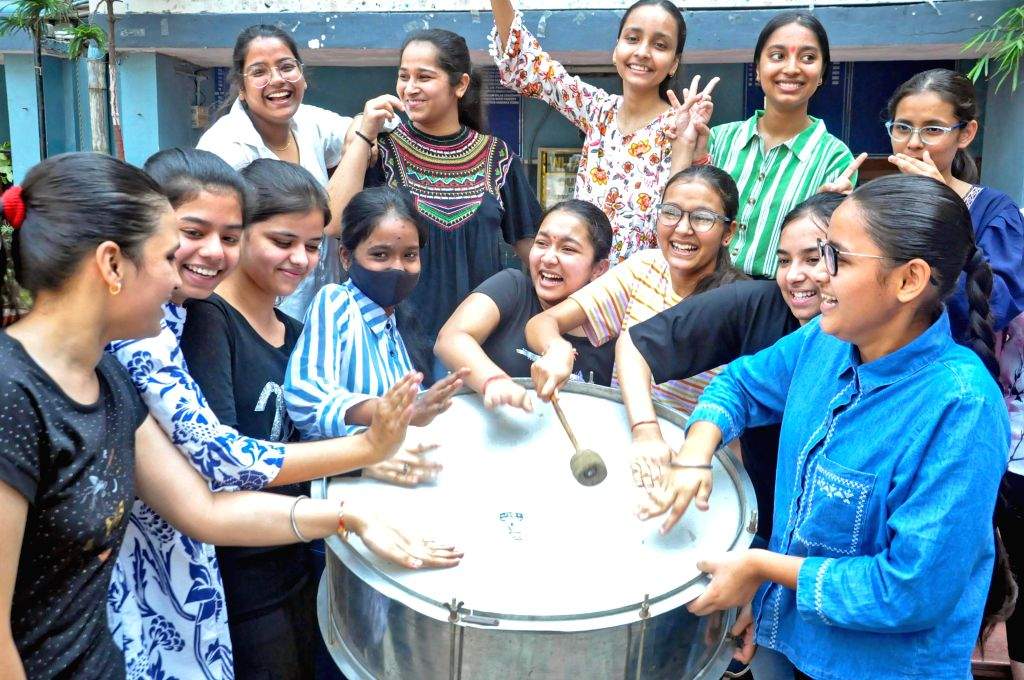Students celebrate after the announcement of class 10th board exam ...