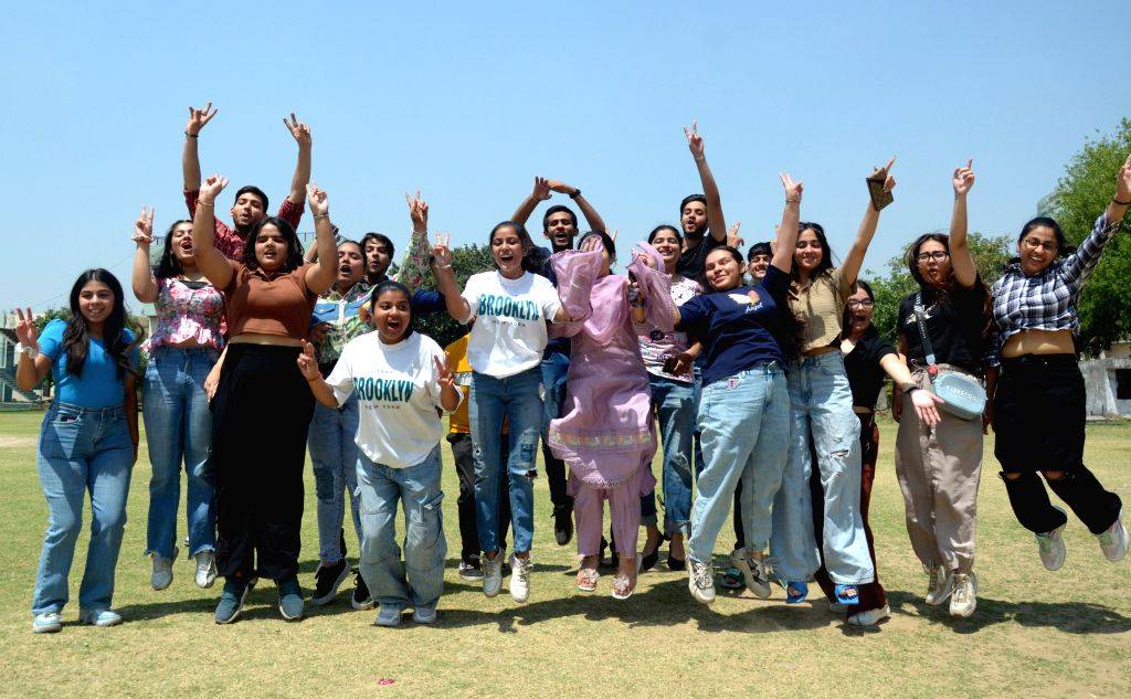 Students celebrate after the announcement of class 12th board exam ...