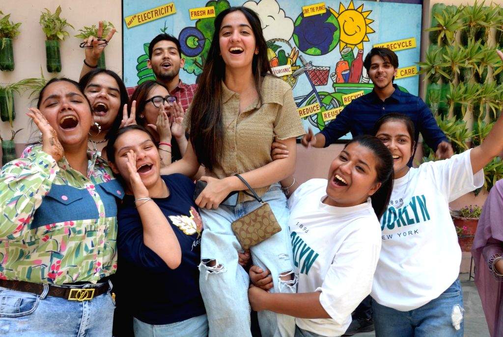 Students celebrate after the announcement of class 12th board exam ...