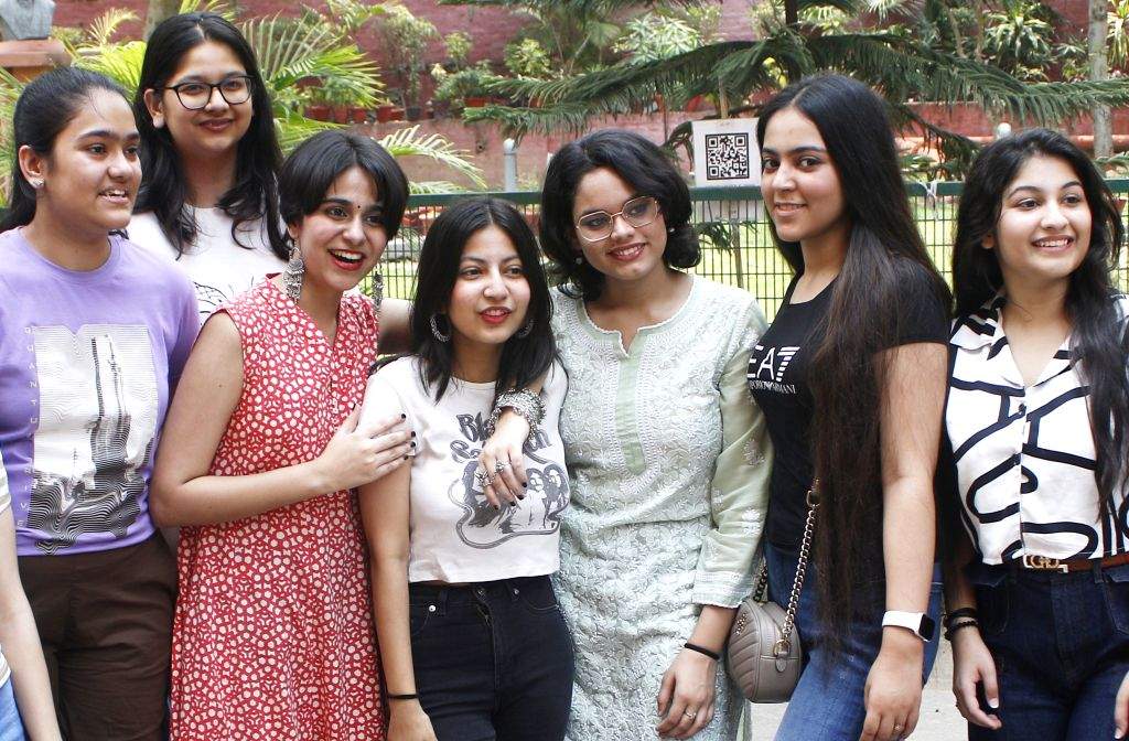 Students celebrate after the CBSE board results announcement