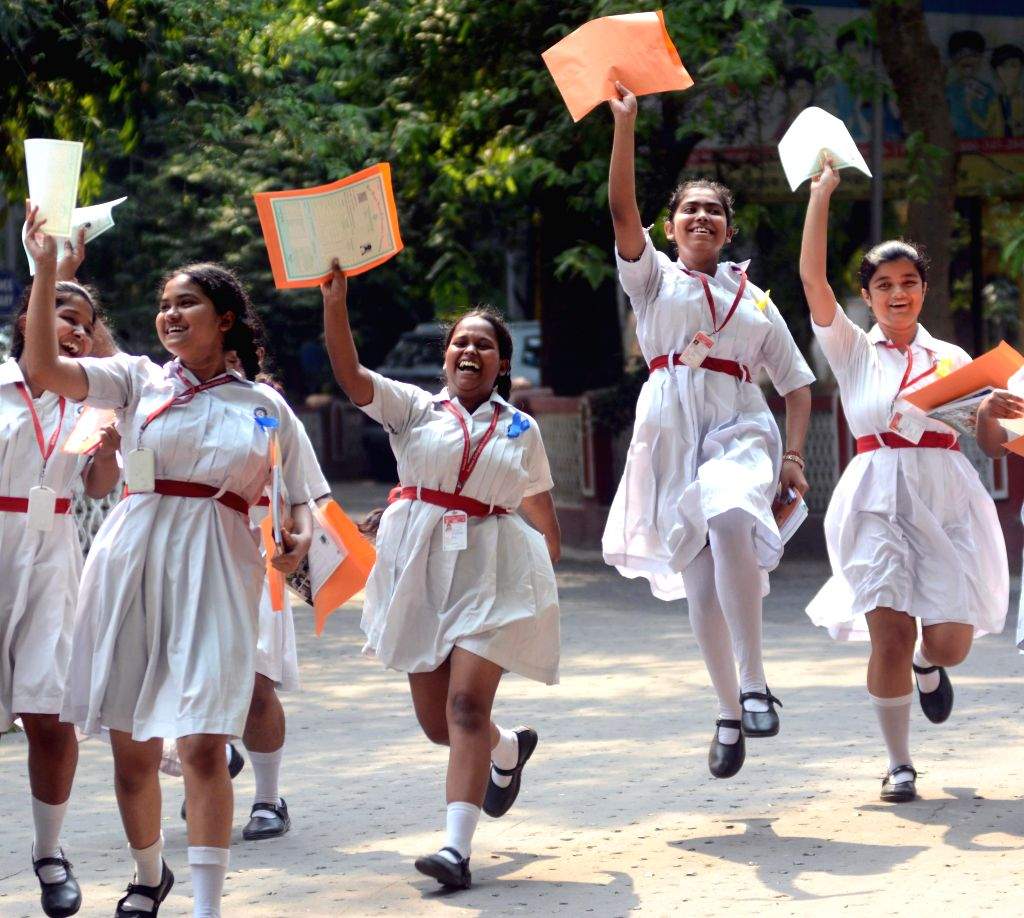 Students celebrate after the WBBSE class 10th examination results were ...