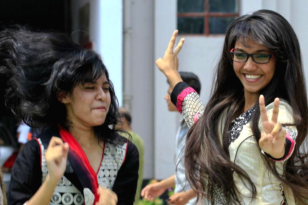Dhaka (Bangladesh): Students celebrate after declaration of SSC results