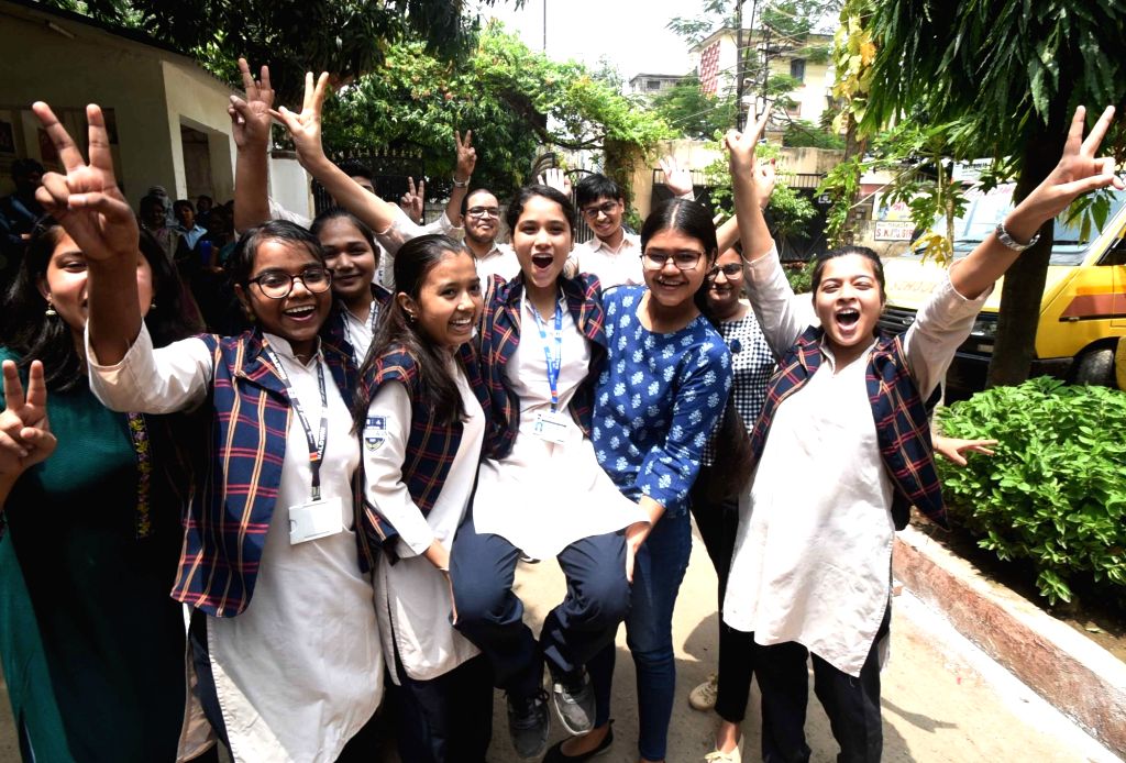 Students celebrate their success after the declaration of class 10th ...