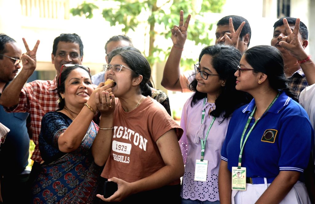 Students celebrate their success after the announcement of CBSE class ...