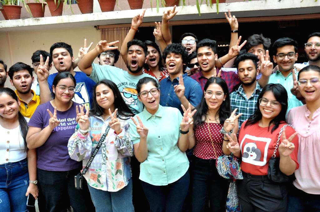 Students celebrate their success after the announcement of CBSE class ...