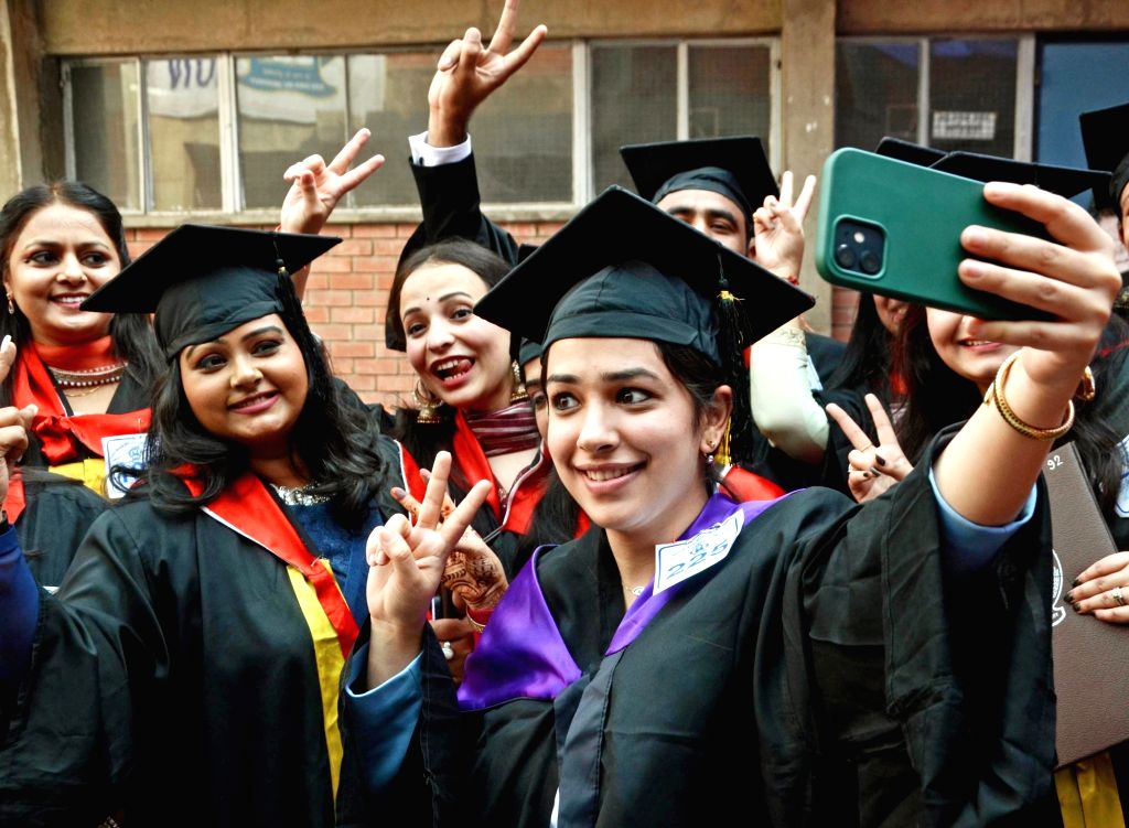 Students click a selfie as they celebrate