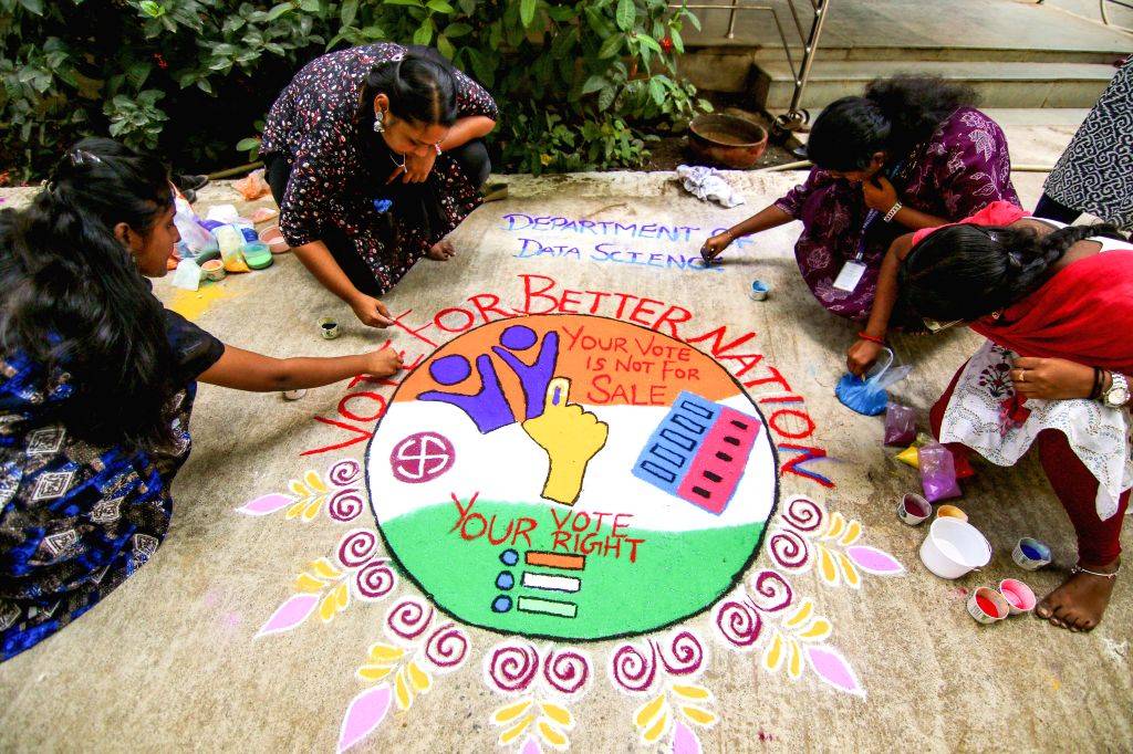 Students create rangoli to promote full voting in Chennai