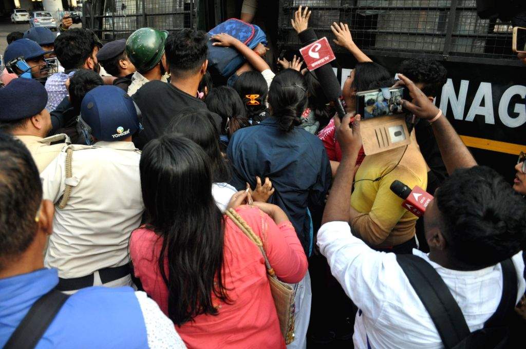 Students' Federation of India (SFI) activists participate in a protest ...