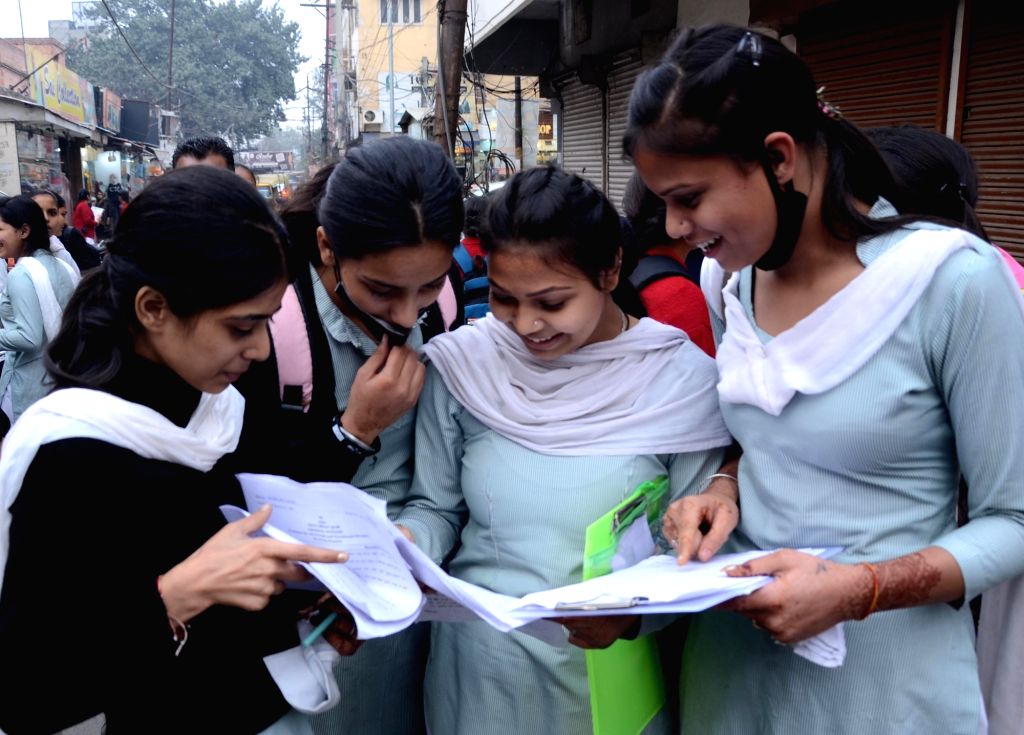 Students of class 12th interact with each other after appearing for the ...