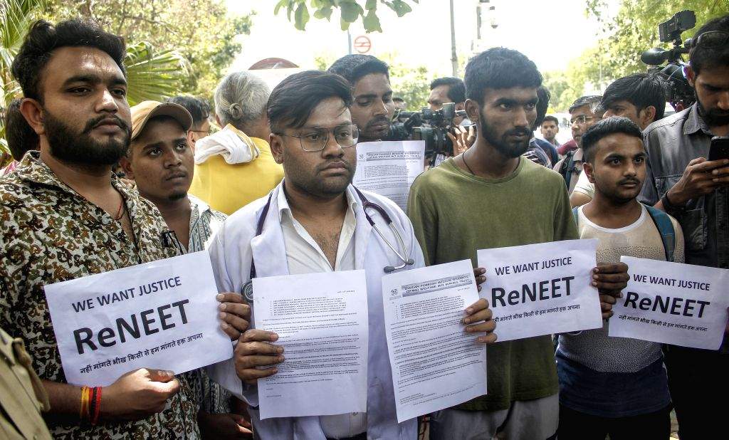 Students stage a protest against alleged irregularities in the NEET ...