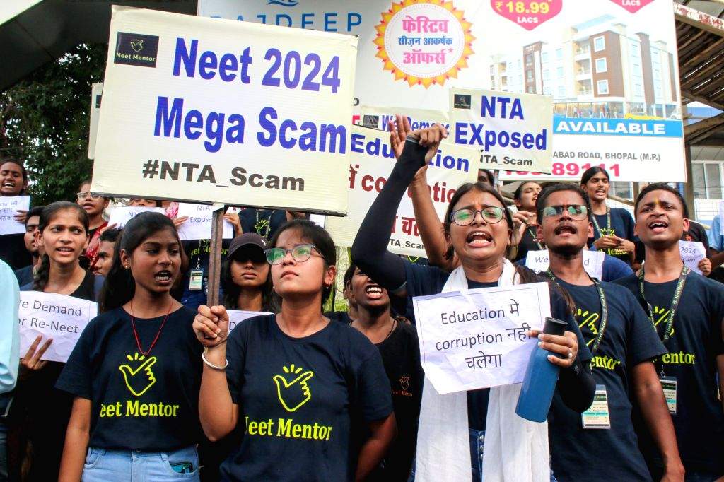 Students stage a protest against alleged irregularities in the NEET ...