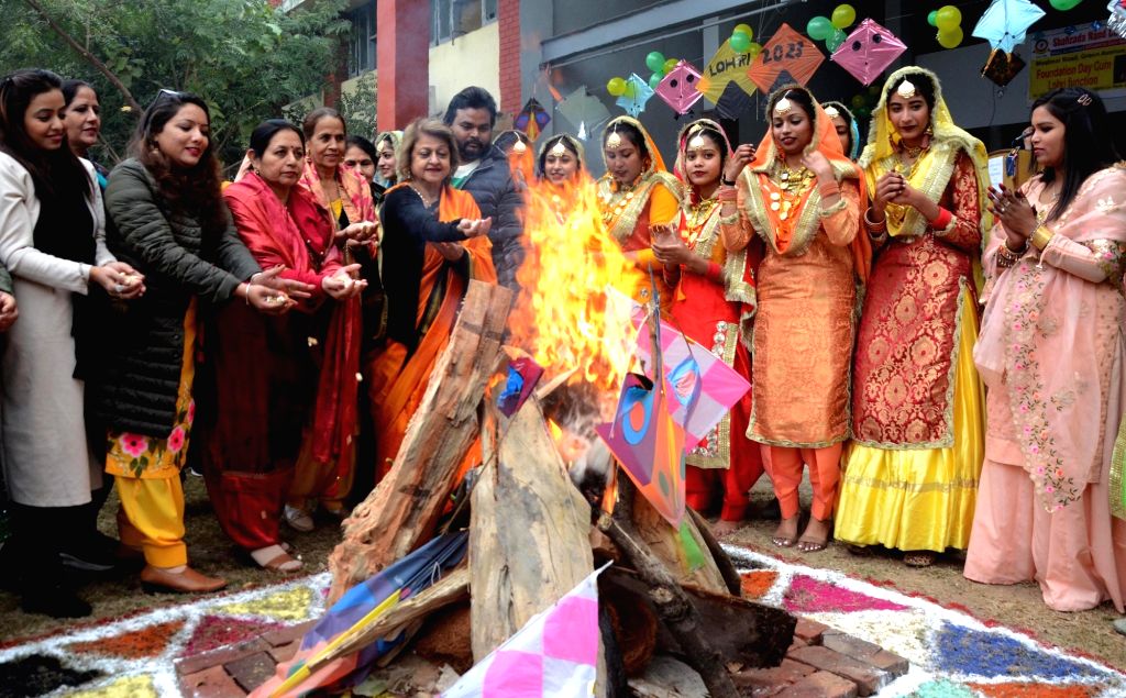 Students wearing traditional Punjabi attire, during an event to ...