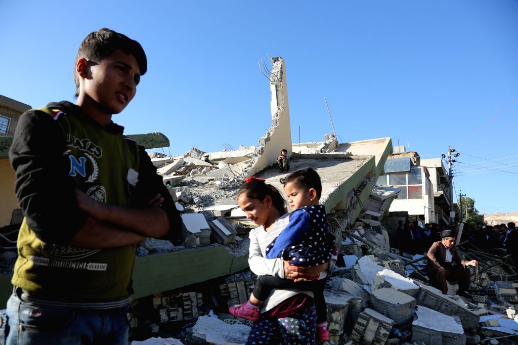 Iran quake: Rouhani vows action over collapsed buildings