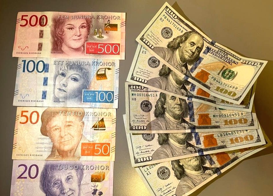 Sweden Swedish Krona Notes And U S Dollar Notes Are Pictured In