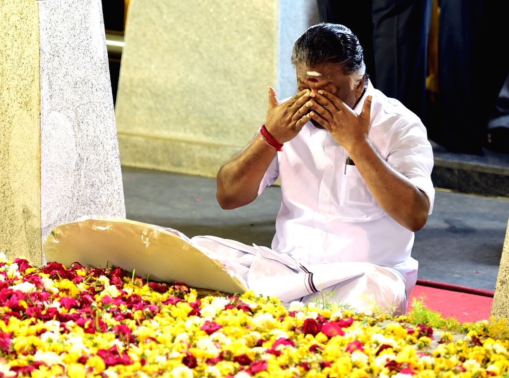 O. Panneerselvam sitting in meditation in front Jayalalithaa's memorial
