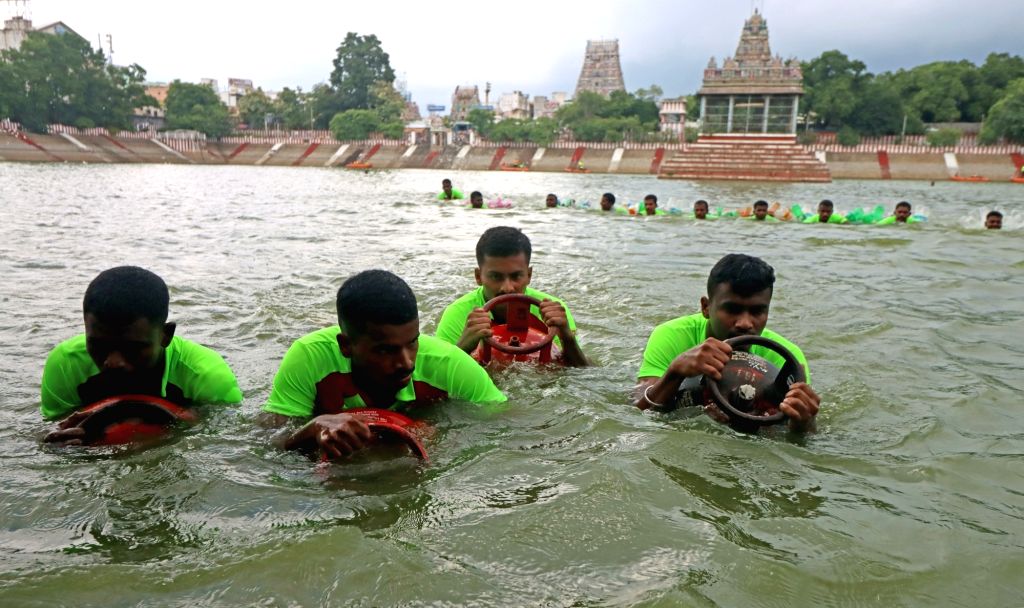 Tamil Nadu Fire and Rescue Service personnel during a mock drill