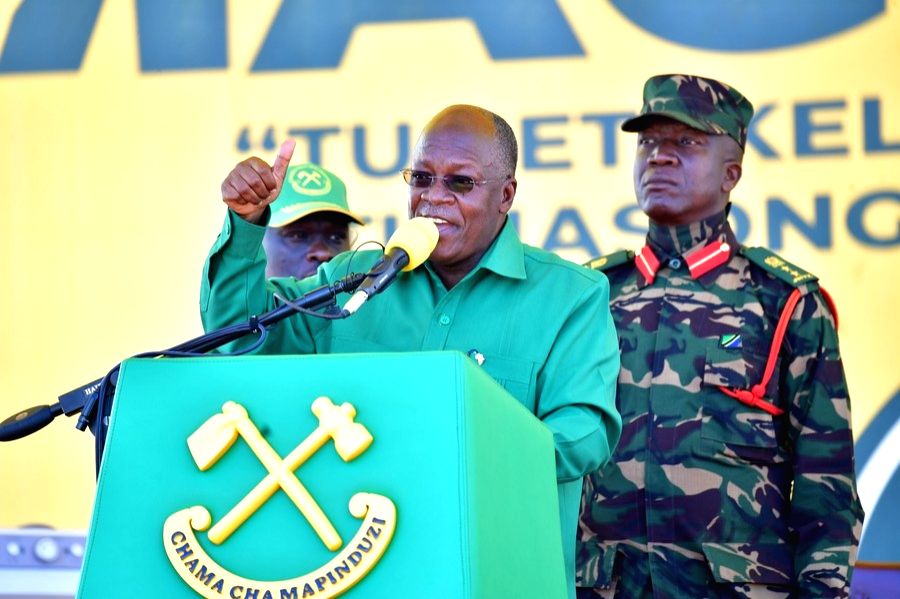 ) Tanzania's President John Pombe Magufuli addresses residents during a ...