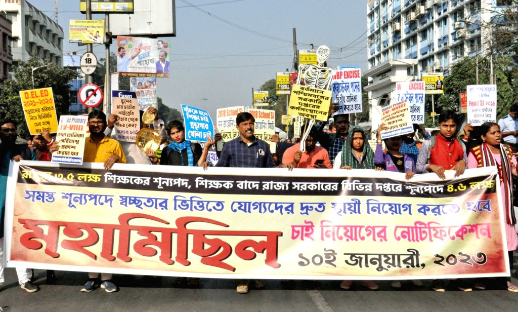 TET and SSC passed candidates take part in a protest rally
