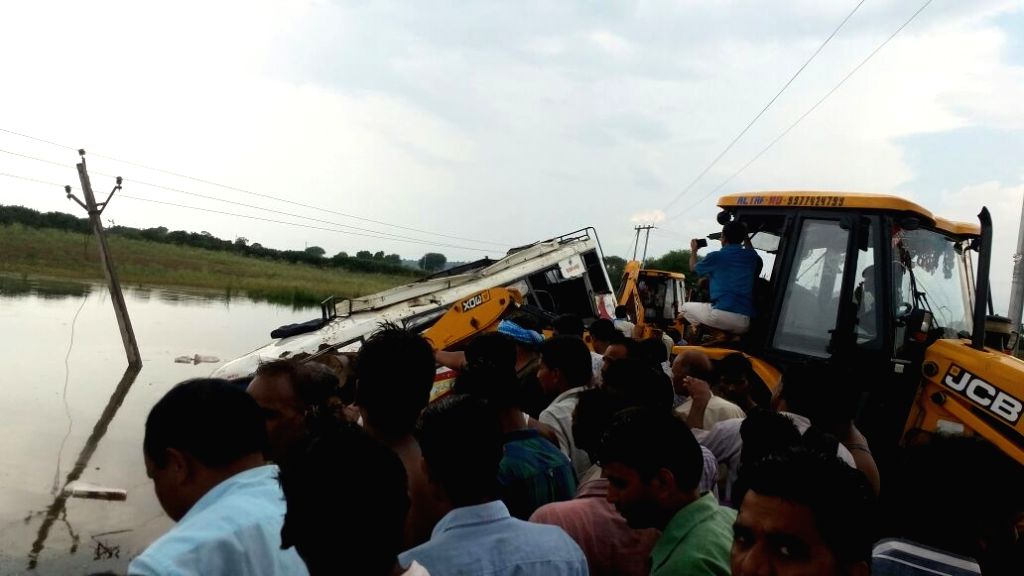 9 killed as bus falls into river in MP