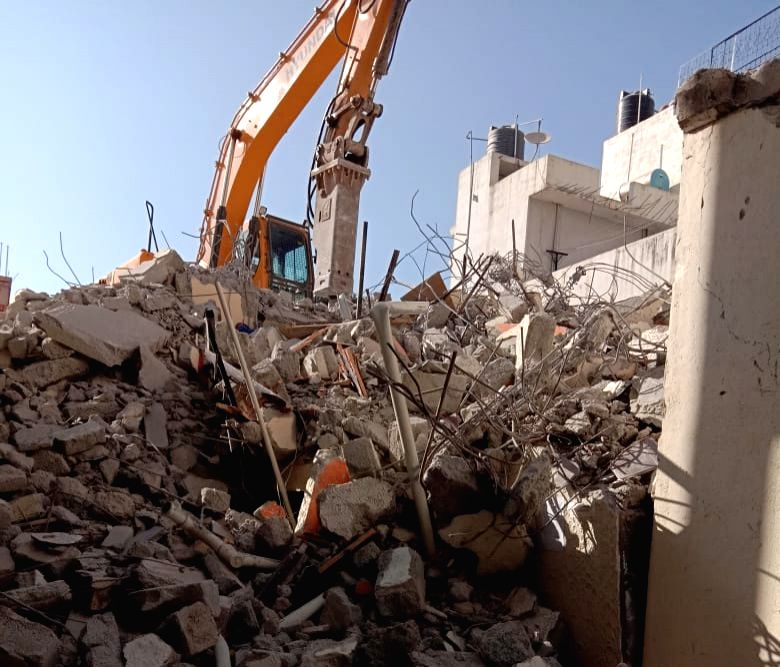 Bengaluru tilted building demolished