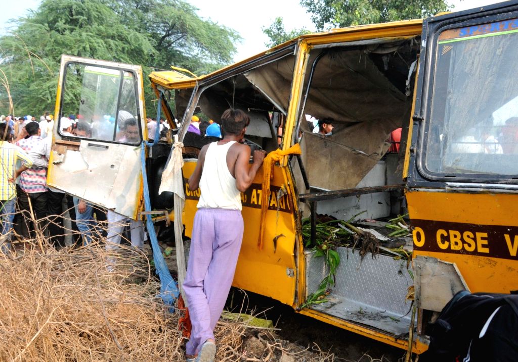 School bus falls into drain