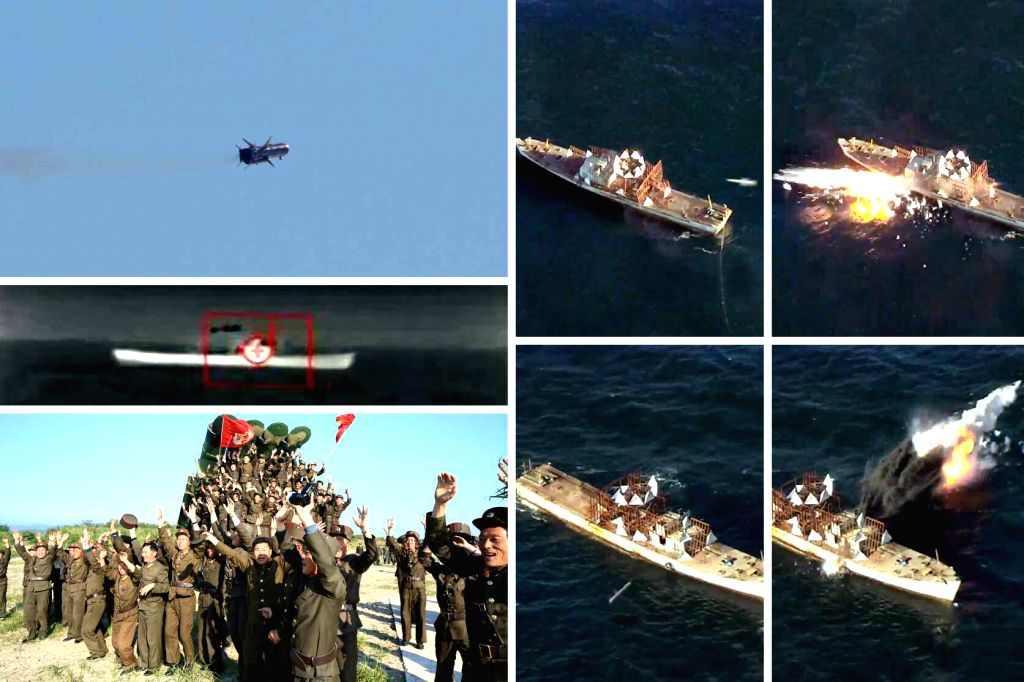 N.K. leader observes missile launch