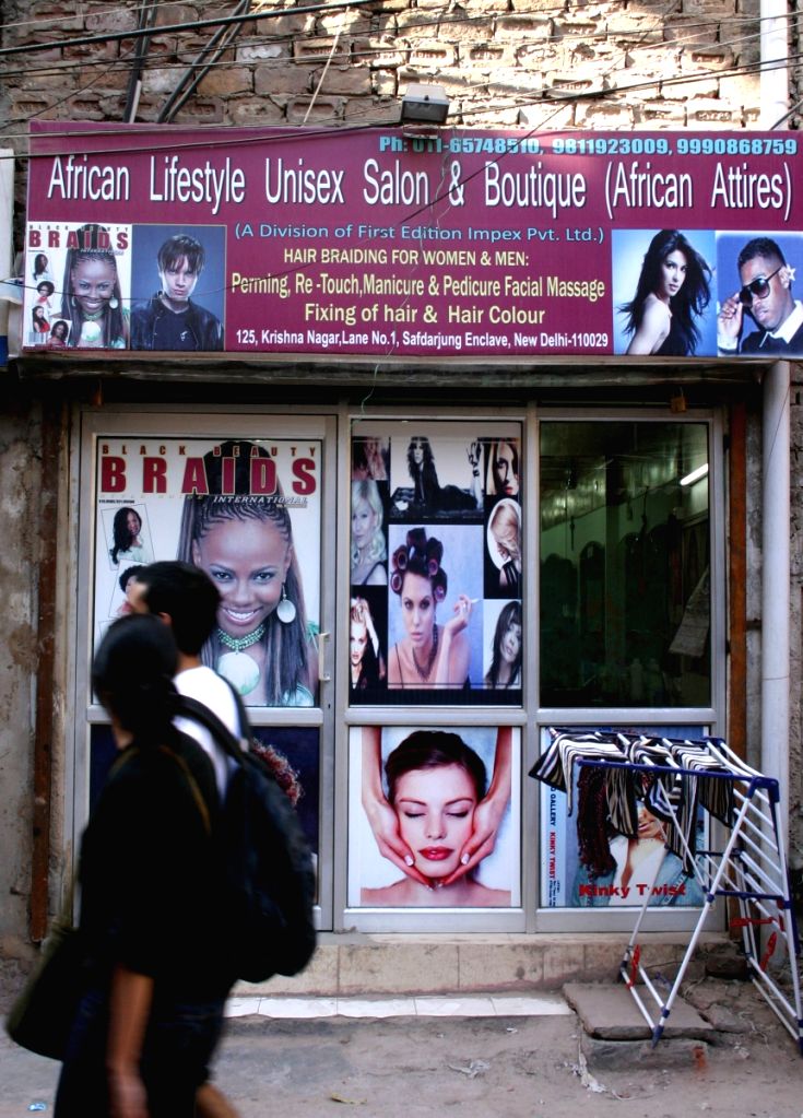 Hairstyling the African way in Indian capital