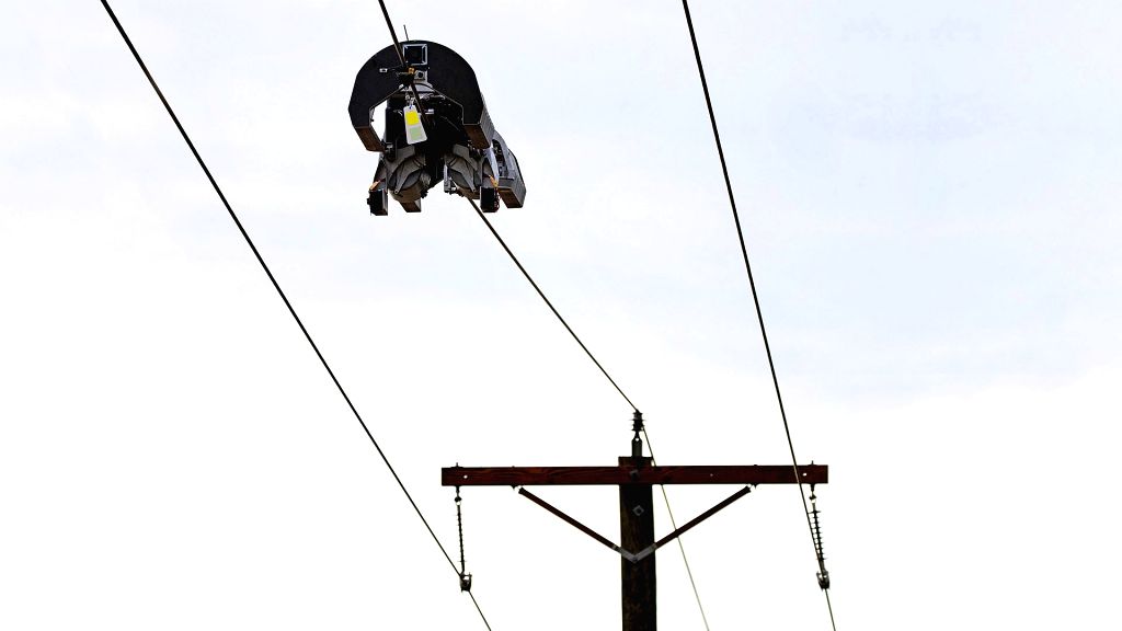 Free Photo: This Facebook robot walks on power lines to install fiber ...