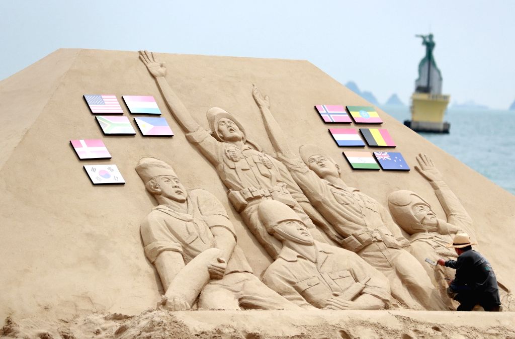 : Busan : This photo shows an artist's sand sculpture at Haeundae Beach.