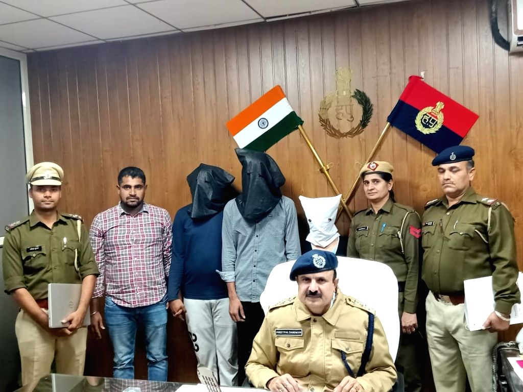 Free photo : Three including woman held for duping people by offering ...