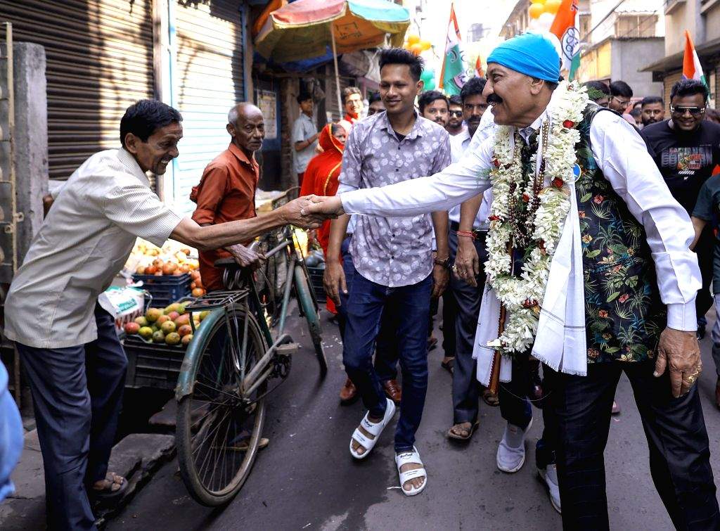 TMC Candidate Prasun Banerjee conducts door to door campaign for the ...