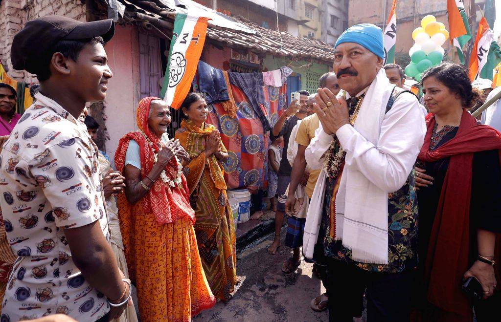 TMC Candidate Prasun Banerjee conducts door to door campaign for the ...