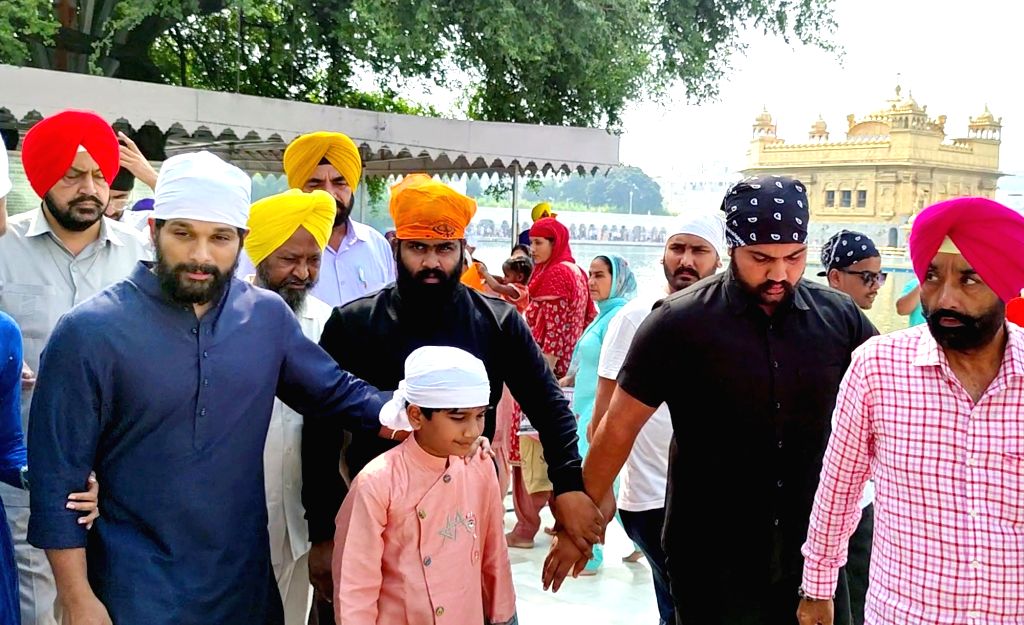 Tollywood actor Allu Arjun along with his family members visit Golden ...