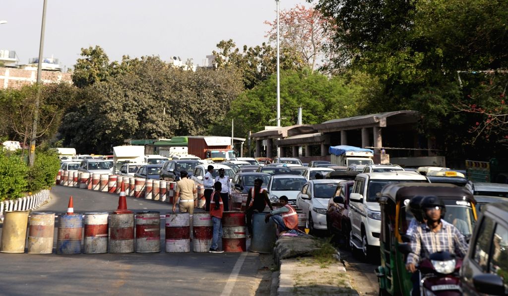 Traffic moves slowly during the construction work of Chirag Delhi flyover