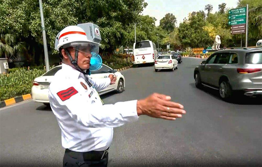 Traffic Police Use AC Helmets Amid Blistering Heatwave