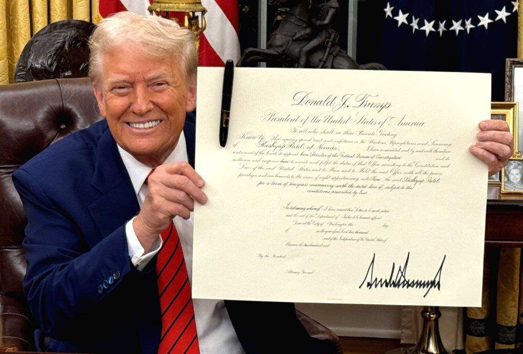 U.S. President Donald Trump signed the commission appointing Kash Patel ...